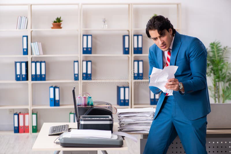 Young Employee Making Copies at Copying Machine Stock Image - Image of ...