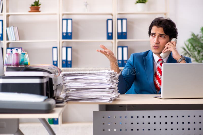 Young Employee Making Copies at Copying Machine Stock Photo - Image of ...