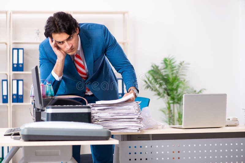 Young Employee Making Copies at Copying Machine Stock Image - Image of ...