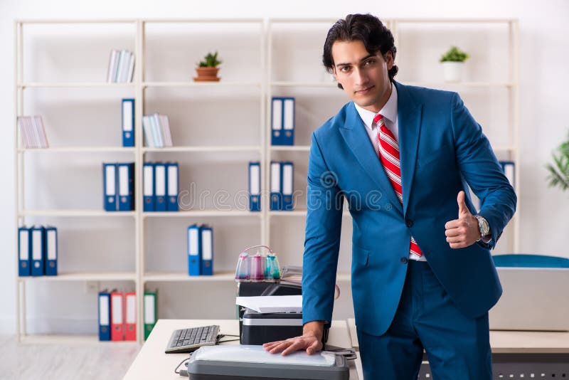 Young Employee Making Copies at Copying Machine Stock Photo - Image of ...