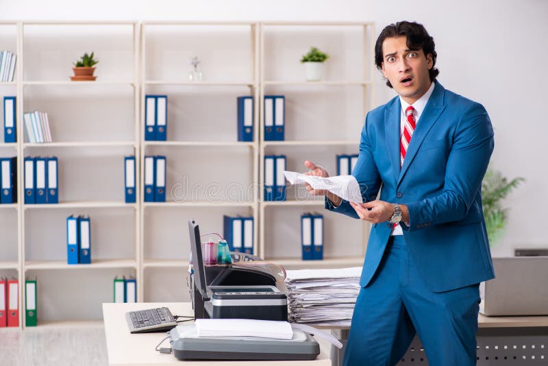 Young Employee Making Copies at Copying Machine Stock Image - Image of ...