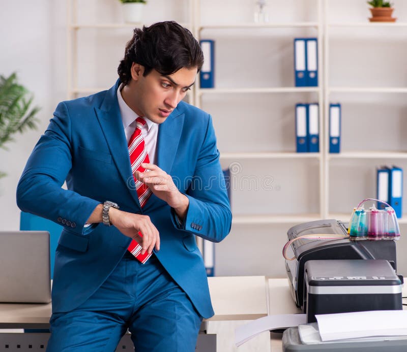 Young Employee Making Copies at Copying Machine Stock Image - Image of ...