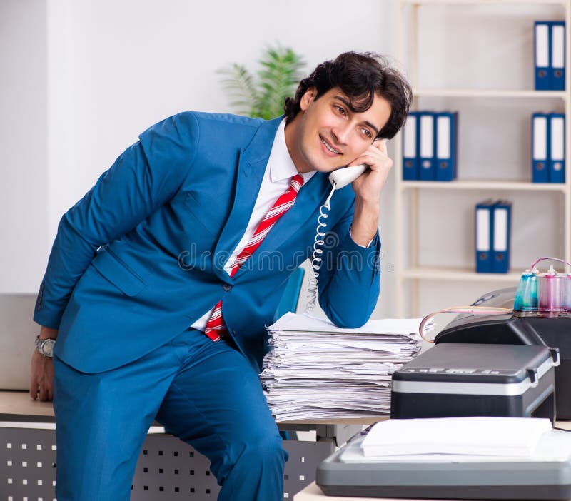 Young Employee Making Copies at Copying Machine Stock Image - Image of ...