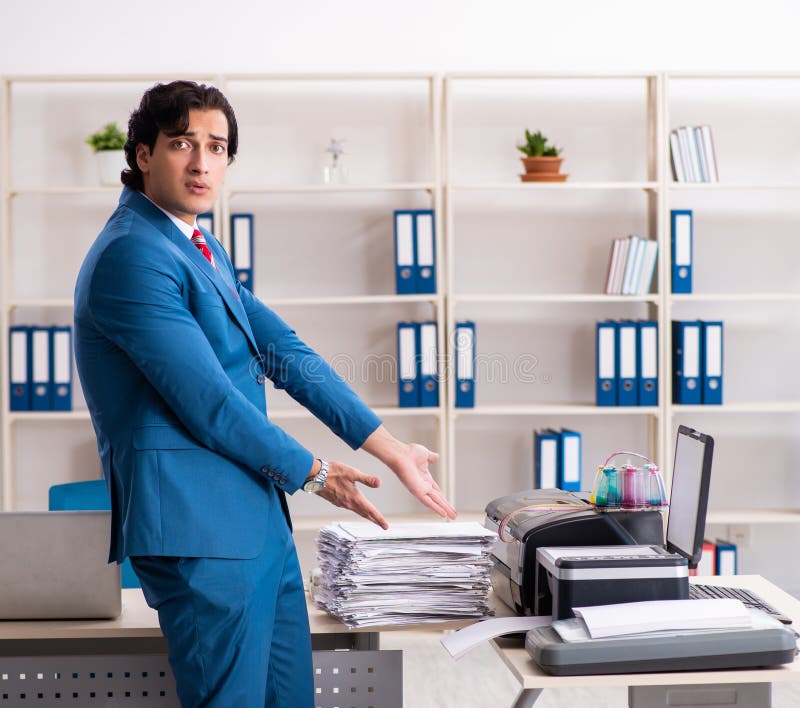 Young Employee Making Copies at Copying Machine Stock Image - Image of ...