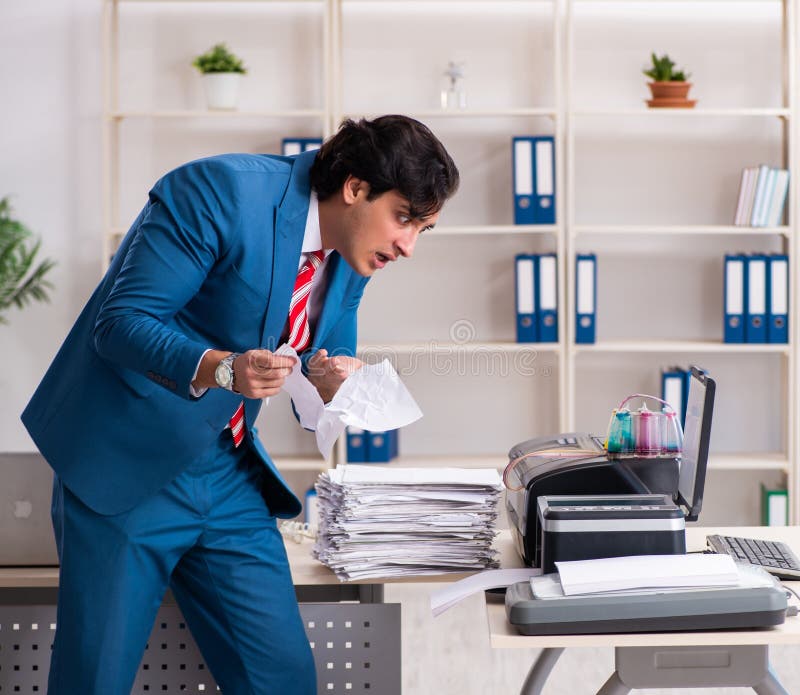 Young Employee Making Copies at Copying Machine Stock Image - Image of ...