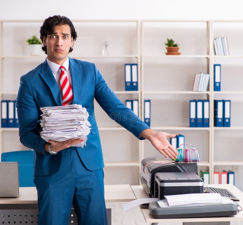 Young Employee Making Copies at Copying Machine Stock Image - Image of ...