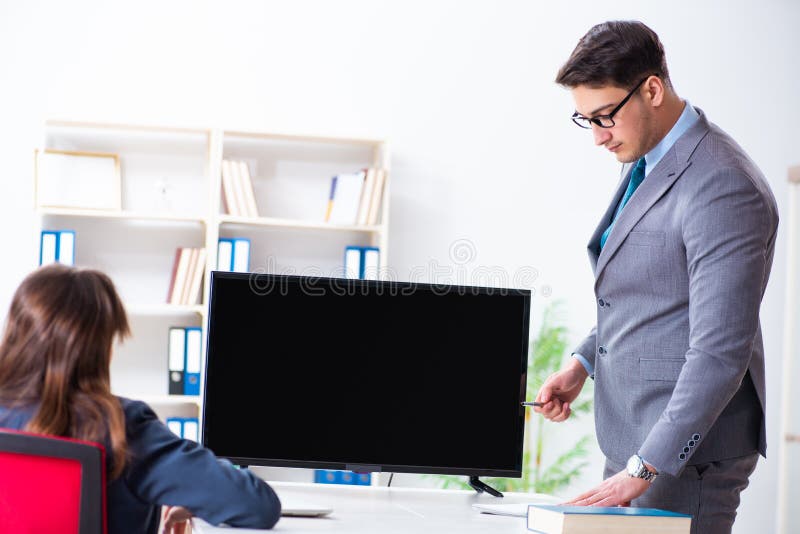 Young Employee Making Presentation To His Female Boss Stock Image ...