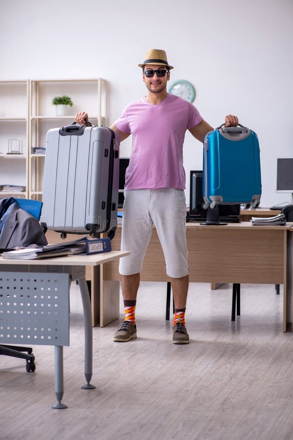 Young Male Employee Preparing for the Trip Stock Photo - Image of ...