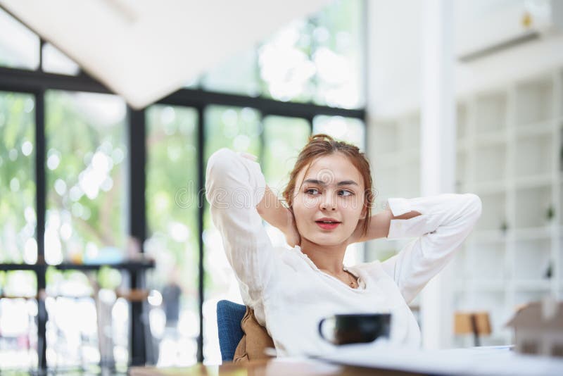 Young Employee Showing a Smile and a Relaxed Expression after Work ...