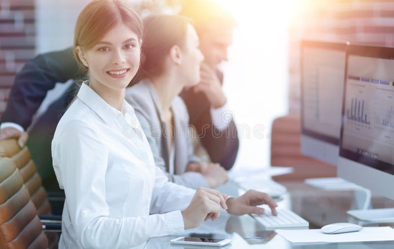Young Employee Sitting at a Desk Stock Image - Image of person ...