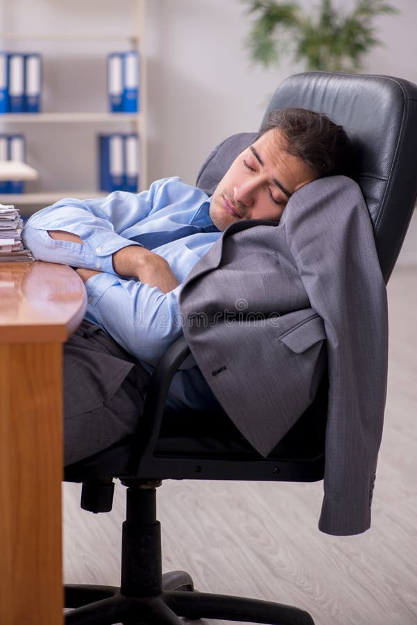 Young Male Employee Sleeping in the Office Stock Image - Image of ...