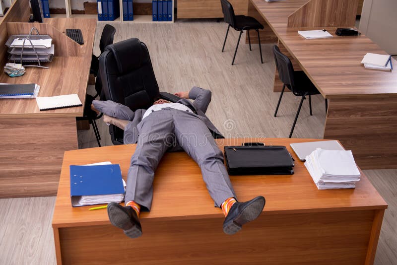 Young Male Employee Sleeping at Workplace Stock Photo - Image of asleep ...