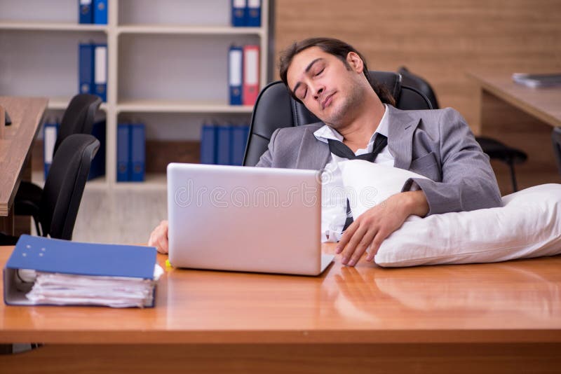 Young Male Employee Sleeping at Workplace Stock Image - Image of ...