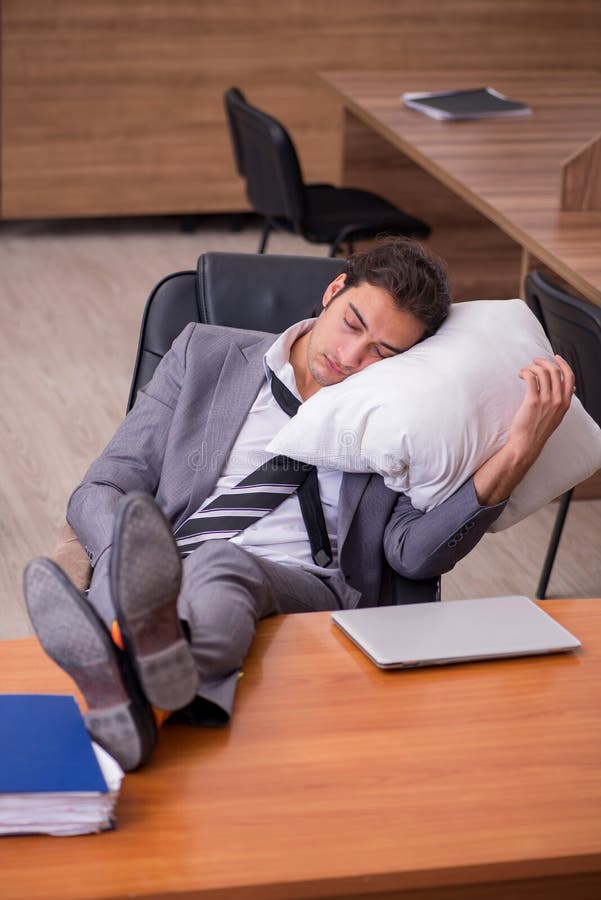 Young Male Employee Sleeping at Workplace Stock Photo - Image of ...