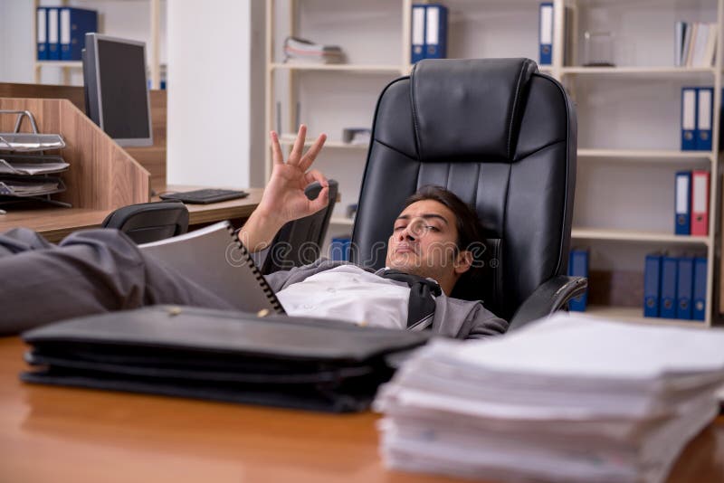 Young Male Employee Sleeping at Workplace Stock Image - Image of ...