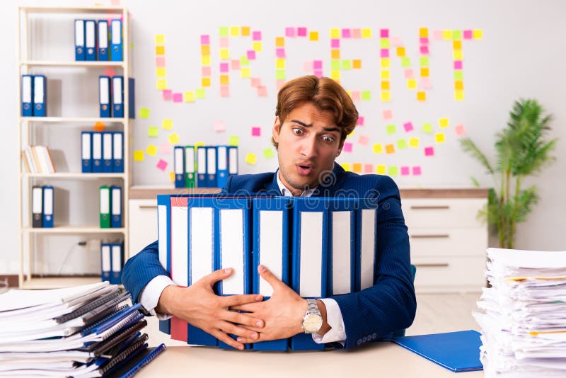 The Young Employee Suffering from Excessive Work Stock Image - Image of ...
