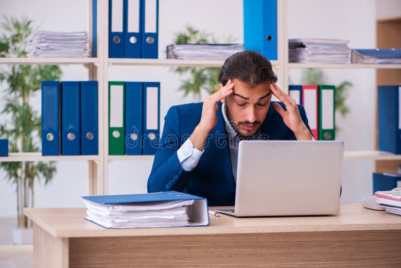 Young Male Employee and Too Many Work in the Office Stock Image - Image ...