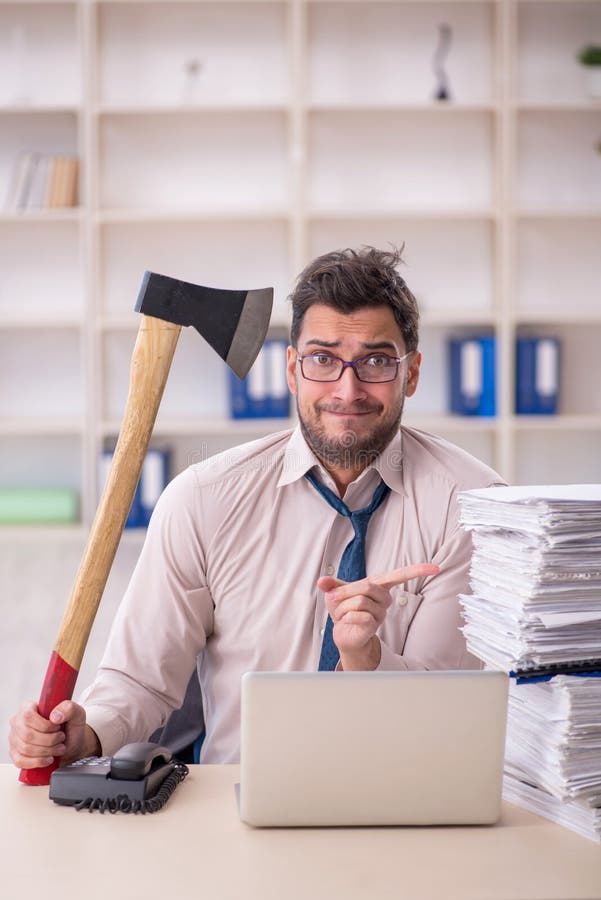 Young Male Employee Unhappy with Excessive Work in the Office Stock ...