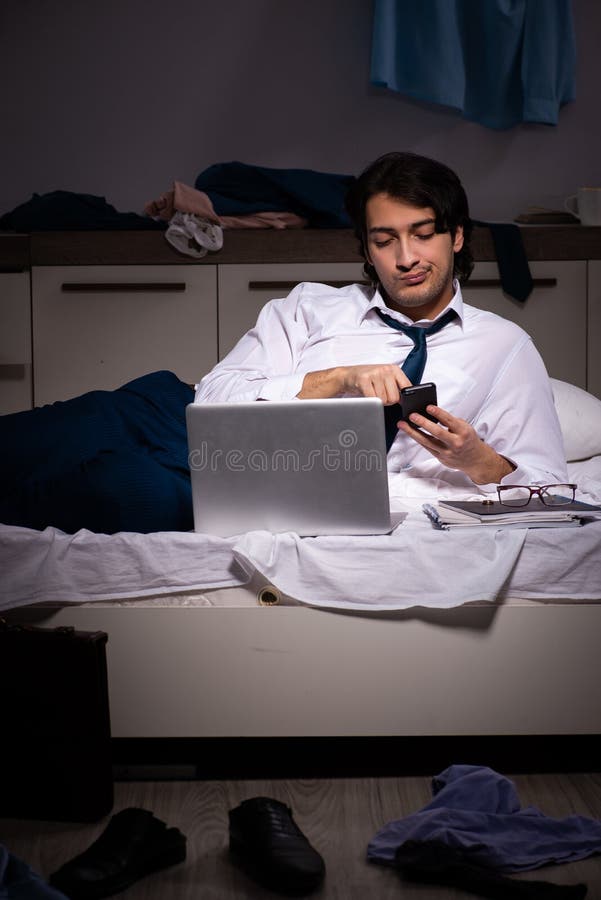 Young Employee Working at Home after Night Shift Stock Image - Image of ...