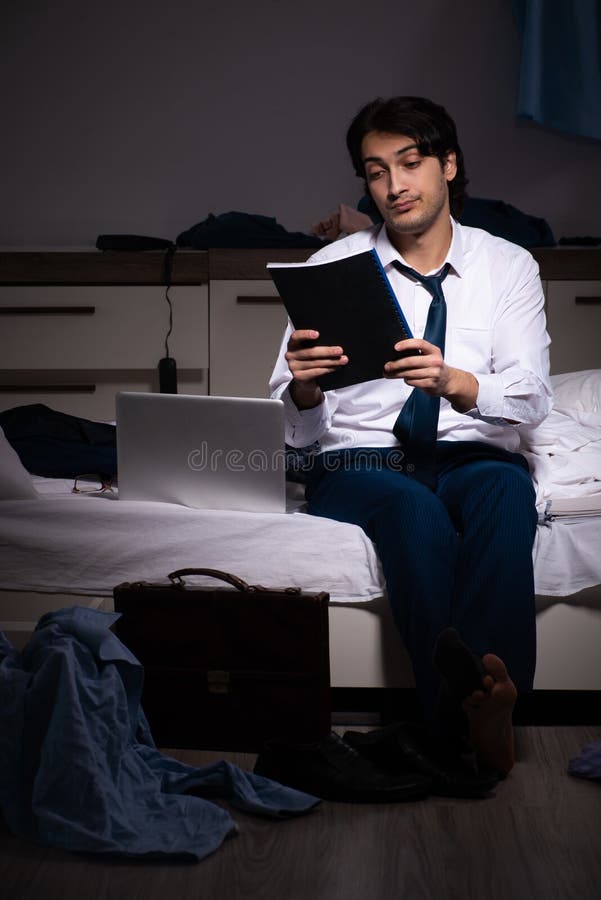 Young Employee Working at Home after Night Shift Stock Image - Image of ...