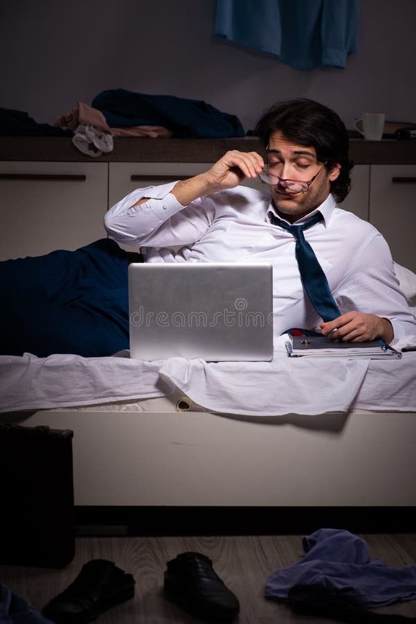 Young Employee Working at Home after Night Shift Stock Photo - Image of ...