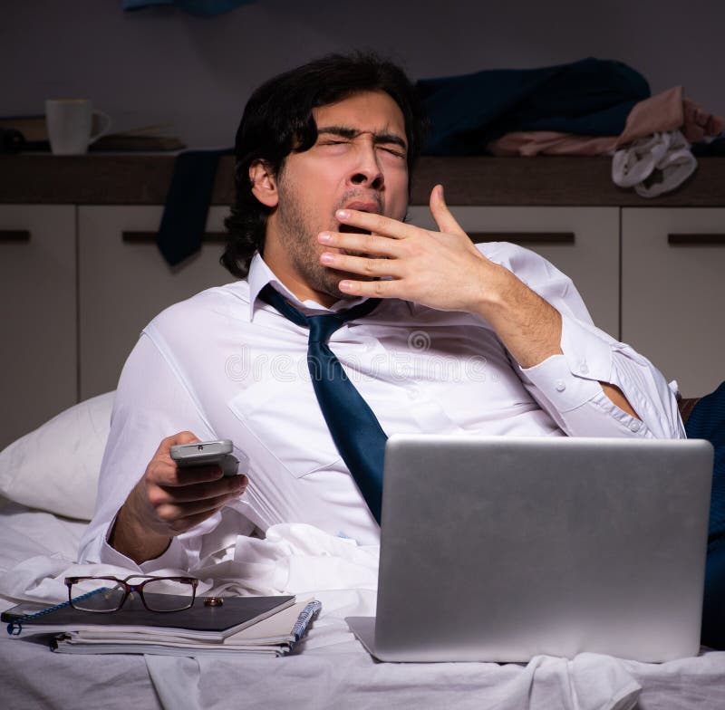 Young Employee Working at Home after Night Shift Stock Image - Image of ...