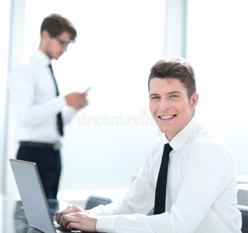 Young Employee Working on a Laptop in the Office Stock Image - Image of ...