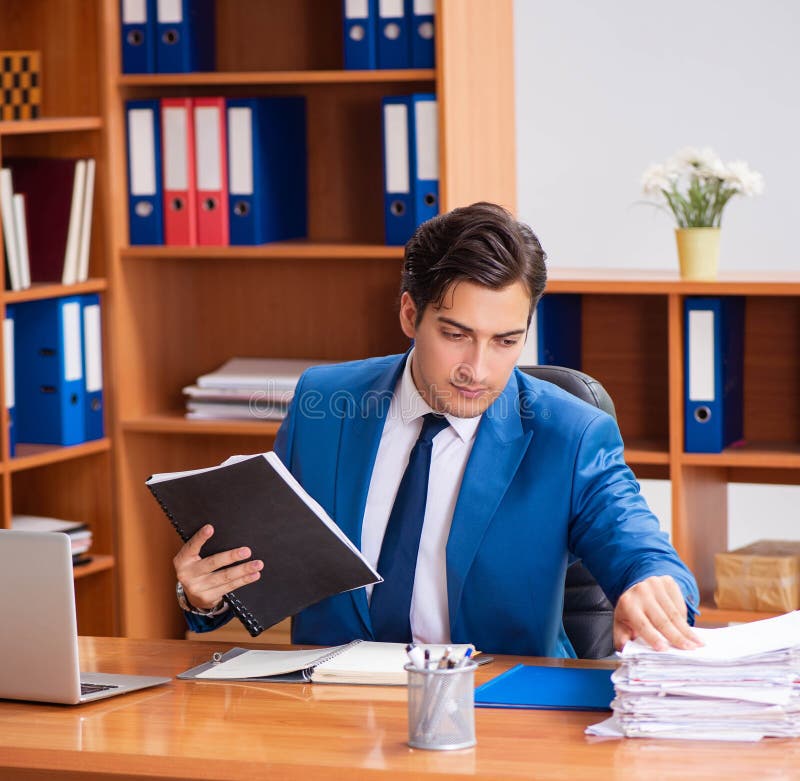 Young Employee Working in the Office Stock Image - Image of overloaded ...