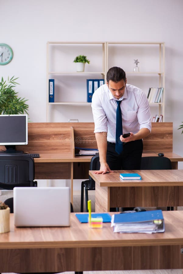 Young Male Employee Working in the Office Stock Photo - Image of ...