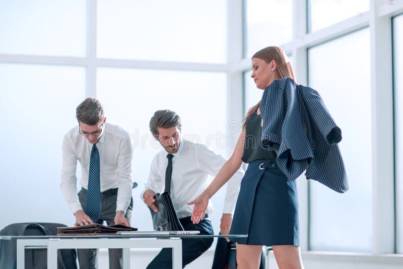 Young Employees Completing Their Working Day at the Workplace Stock ...