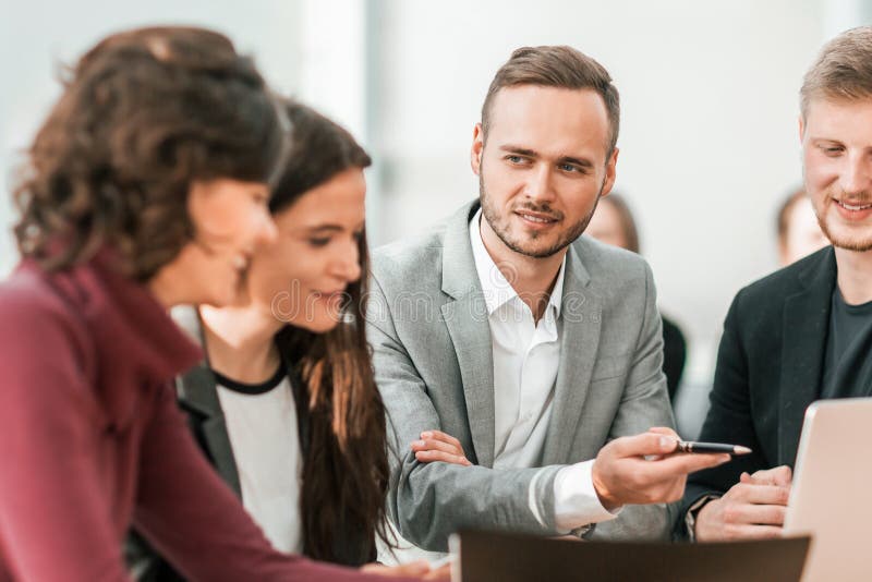 Young Employees Discussing Problems at a Group Meeting. Stock Image ...