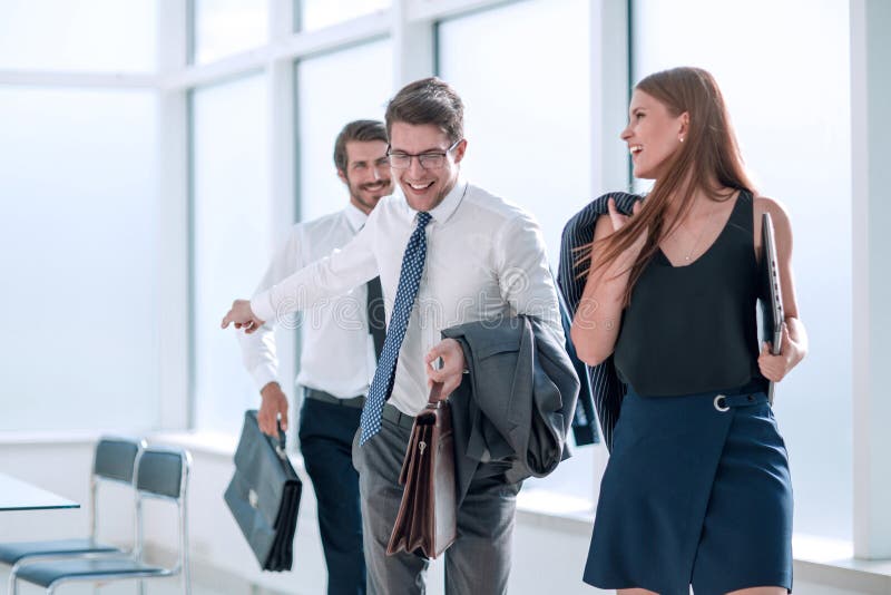 Young Employees Leaving the Office at the End of the Working Day Stock ...
