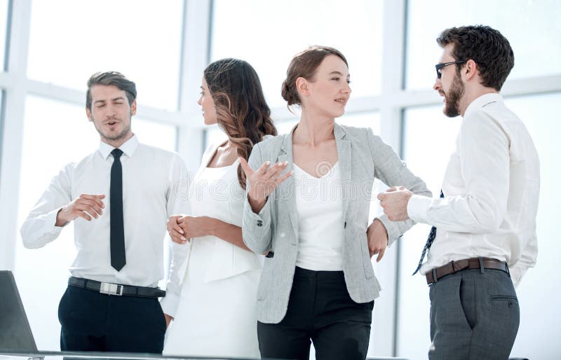 Young Employees Talk in the Office Stock Photo - Image of occupation ...