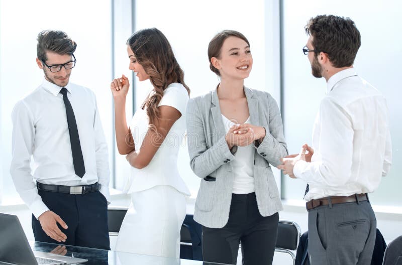 Young Employees Talk in the Office Stock Photo - Image of modern ...