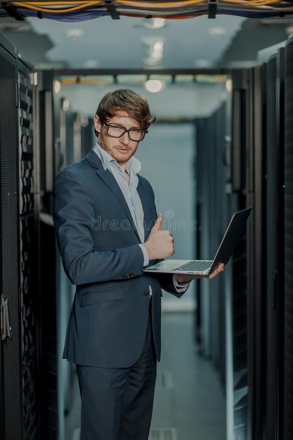 Young it Engeneer Business Man with Thin Modern Aluminium Laptop in ...