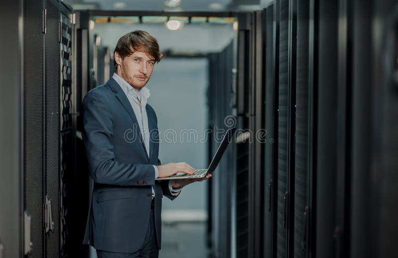 Young it Engeneer Business Man with Thin Modern Aluminium Laptop in ...