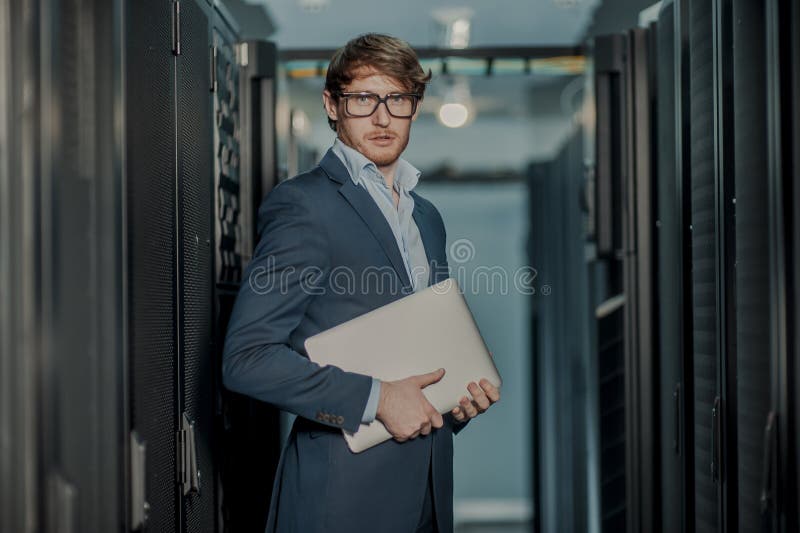 Young it Engeneer Business Man with Thin Modern Aluminium Laptop in ...