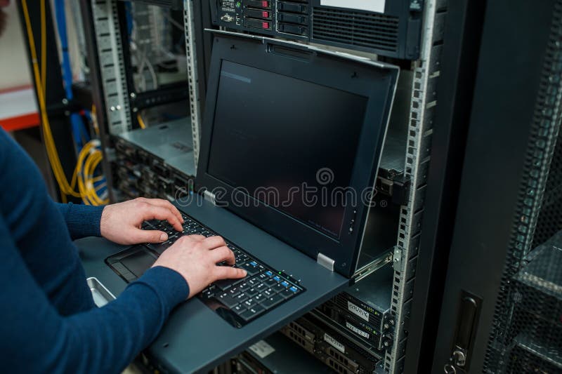 Network Engineer Working in Server Room Stock Photo - Image of hardware ...