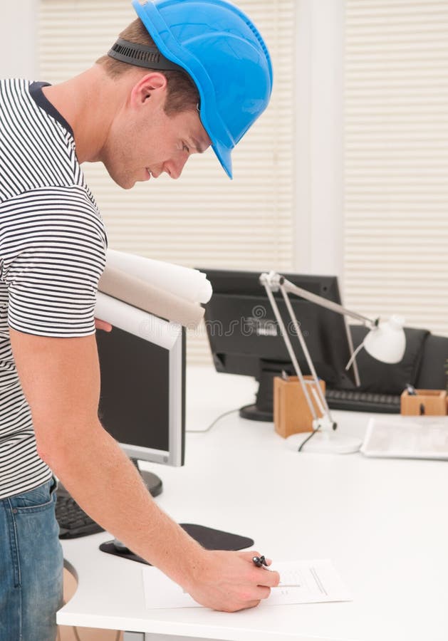 Young engineer stock image. Image of desk, numbers, architect - 14616571