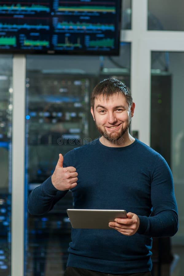 Young Engineer Businessman with the Tablet in Network Server Room Stock ... Young Engineer Businessman with the Tablet in Network Server Room Stock ...