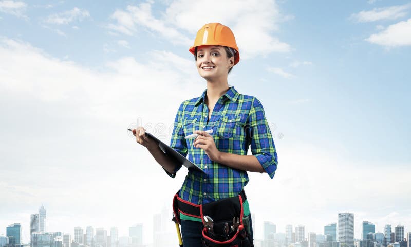 Young Engineer in Hardhat Standing in Front Stock Photo - Image of ...