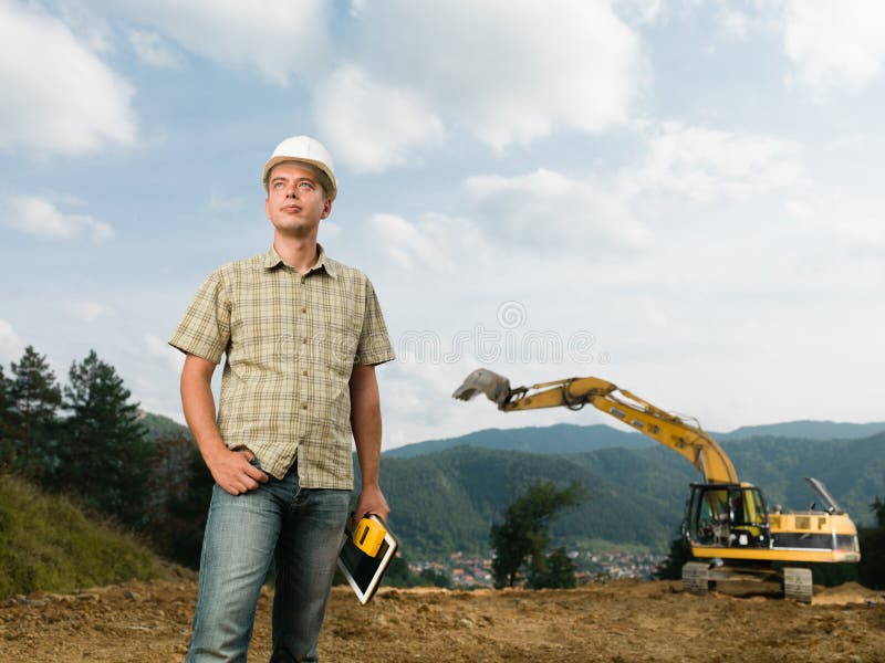 Young Engineer Looking at Construction in Progress Stock Image - Image ...