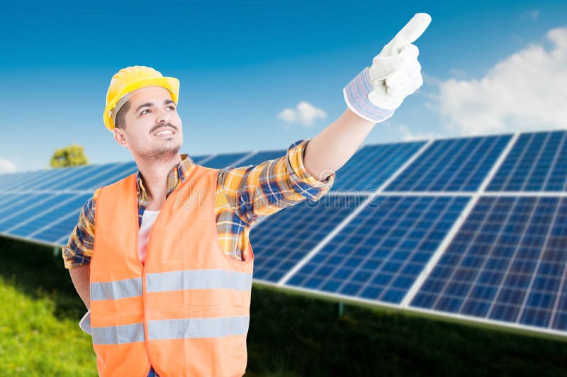 Young Engineer Pointing Finger Up Stock Image - Image of panel, gloves ...