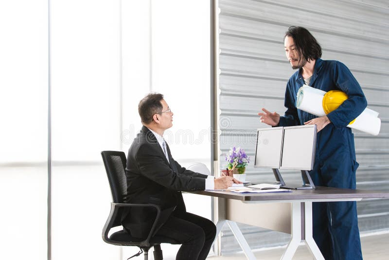 Young Engineer Present Work To Executive Engineer Stock Image - Image ...