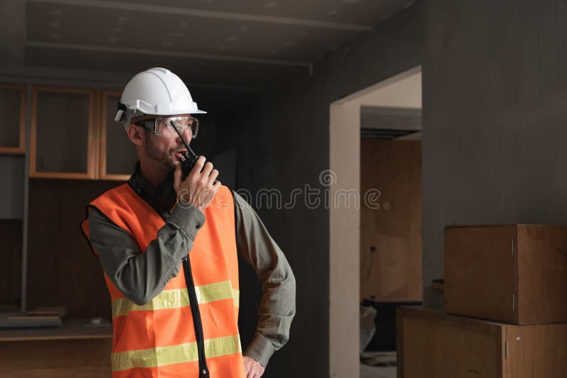 Construction Worker Communicating Radio Wearing Safety Gear Stock ...