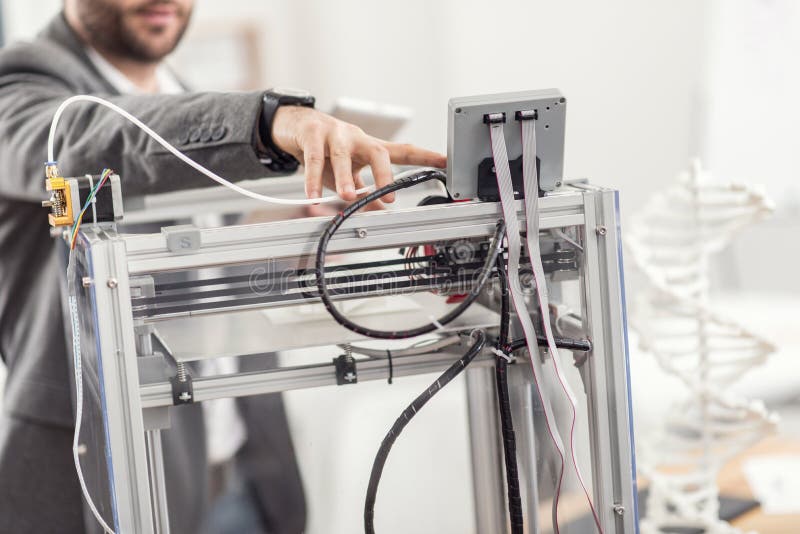 Young Engineer Starting Operation of 3D Printer Stock Photo - Image of ...