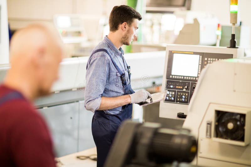 People Working at Engineering Workshop Stock Photo - Image of worker ...