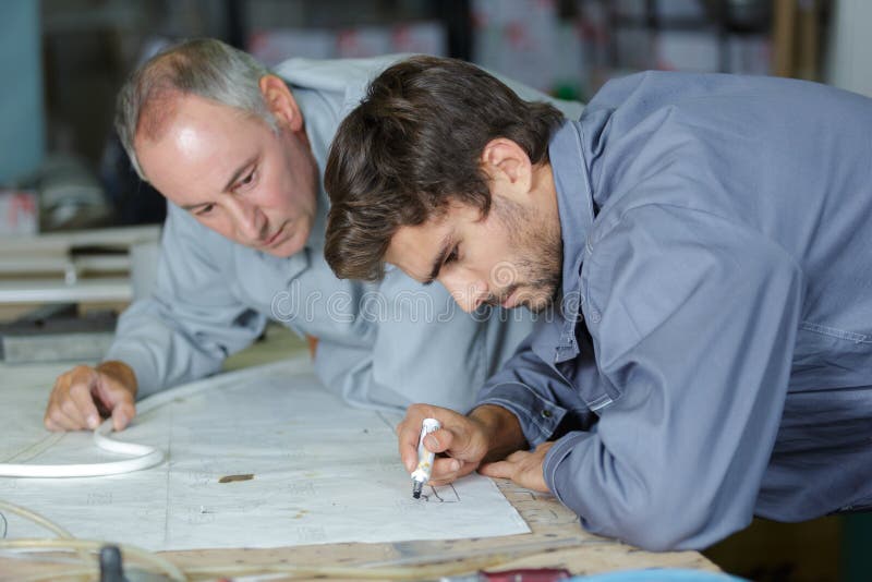 Young Engineer with Teacher Stock Photo - Image of businessperson, male ...