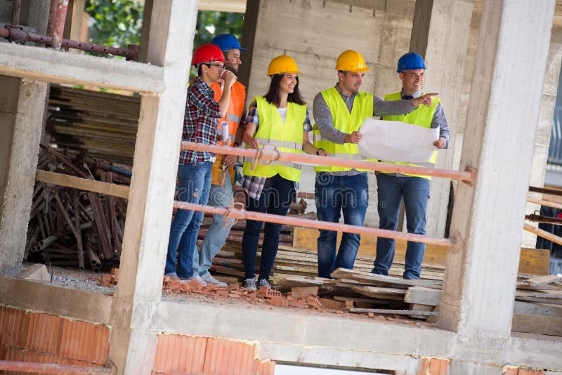 Young Engineer Team Show Building Place As Planned Stock Image - Image ...