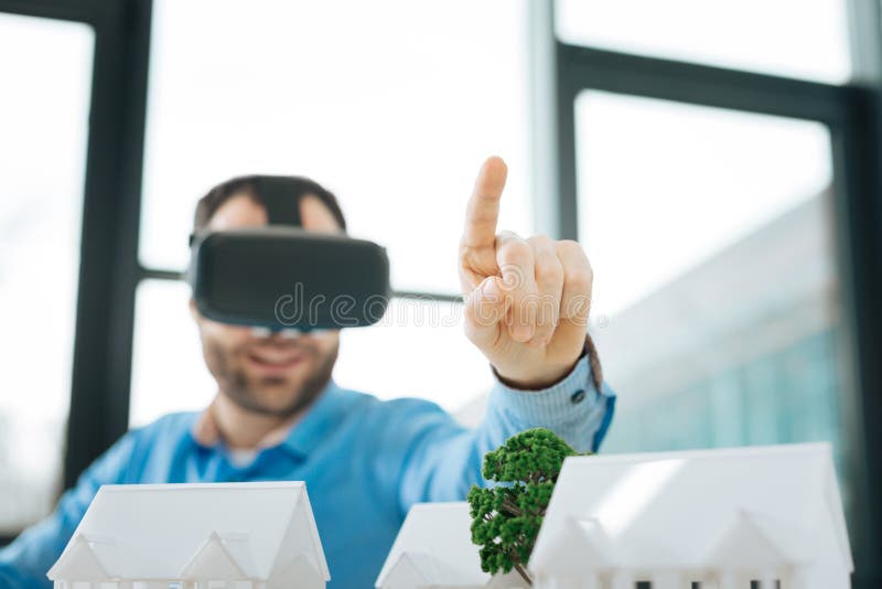 Young Engineer Touching an Object in Virtual Reality Stock Photo ...